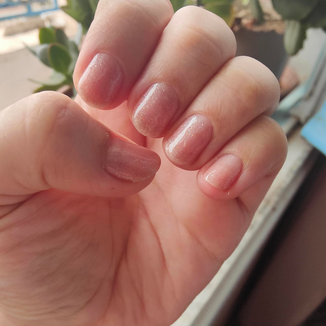 Very light pink with glitter. Thoughts? I feel like it's not visible ...
